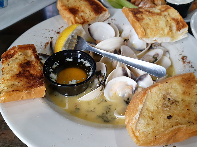 A seafood symphony in a bowl &ndash; these steamed clams swimming in garlic wine sauce might make you consider moving closer to Trexlertown permanently.
