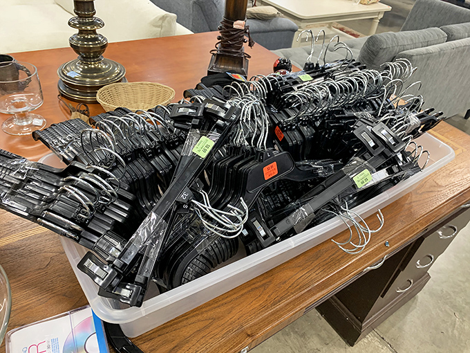 A mountain of hangers awaits its next assignment. Like matchmakers for clothing, they'll soon connect someone with their next favorite shirt or dress.