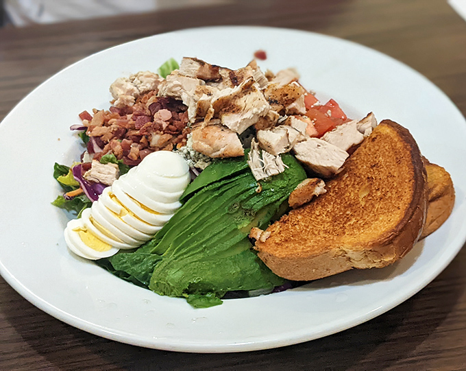 This Cobb salad isn't just lunch &ndash; it's a colorful masterpiece of fresh ingredients that makes eating healthy feel like cheating.