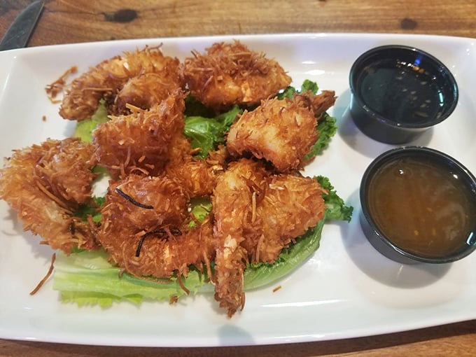 Coconut shrimp that could convert non-seafood eaters&mdash;crispy, sweet, tropical perfection that demands to be dunked in those accompanying sauces.