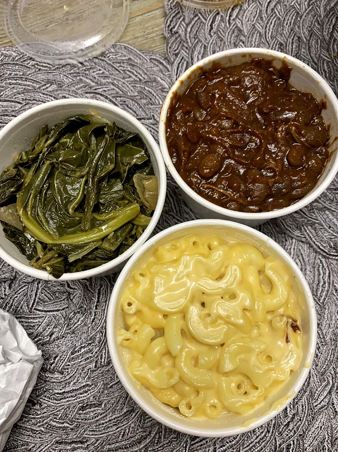 Southern comfort in three perfect bowls: collard greens for your conscience, mac and cheese for your soul, and burnt end beans for your barbecue education.