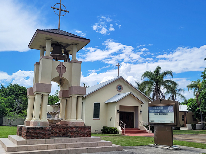 The Community Presbyterian Church stands as a spiritual landmark, its bell tower reaching skyward like the prayers of generations of Clewiston families. 