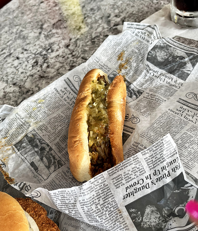 The Chicago-style hot dog&mdash;where every topping has earned its place through decades of delicious democracy. That relish green is practically neon with flavor.