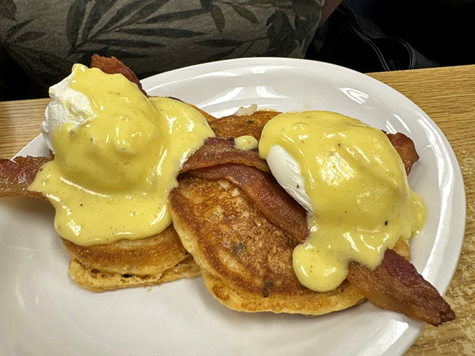 Eggs Benedict with a Southern accent&mdash;cornmeal cakes replace English muffins in this brilliant twist that makes perfect sense once you taste it.