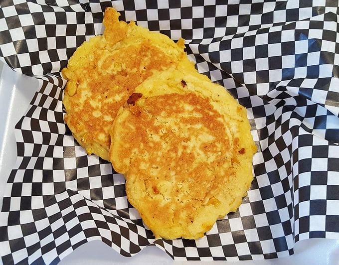These golden corn fritters aren't just breakfast &ndash; they're edible sunshine that somehow made it onto a plate.