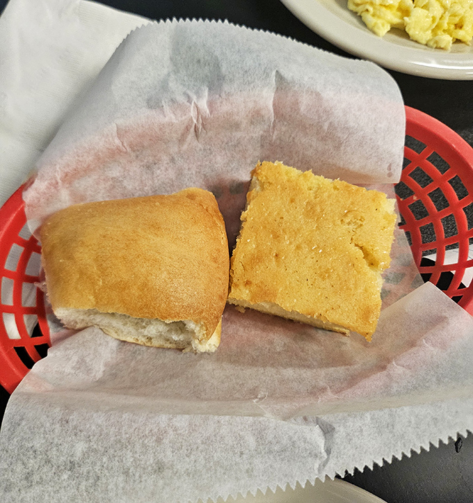 Golden cornbread that crumbles just right, served in a no-nonsense basket. The kind of bread that makes you forget all about your carb-counting promises.