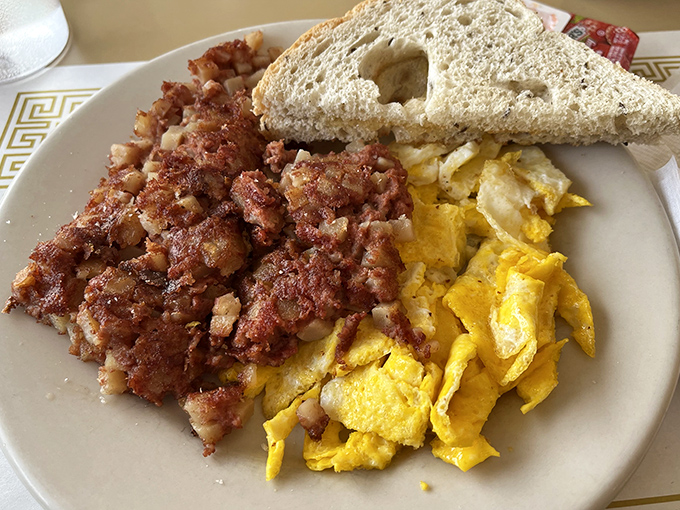 Corned beef hash with that perfect crispy-to-tender ratio &ndash; the breakfast equivalent of hitting all green lights on your morning commute.