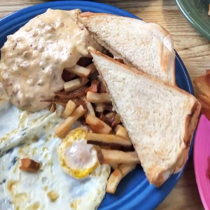 The breakfast trifecta: perfectly cooked eggs, golden pancakes, and bacon that strikes the ideal balance between crisp and chewy. Morning nirvana achieved.
