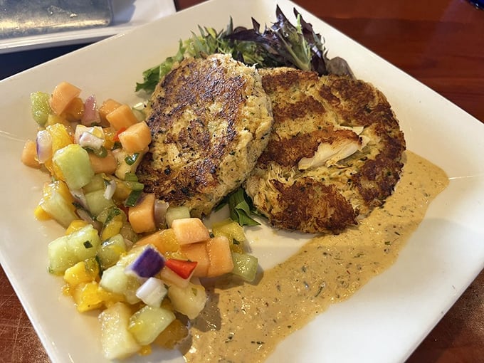 Crab cakes that actually taste like crab &ndash; a revolutionary concept that Schooners has mastered with a side of tropical fruit salsa.