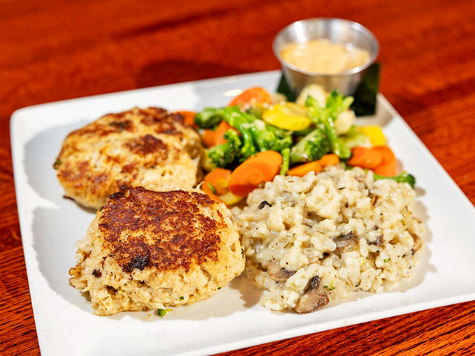 These crab cakes aren't just good, they're "text your friends immediately" good. Perfectly golden, minimal filler, and served with risotto that deserves its own spotlight.