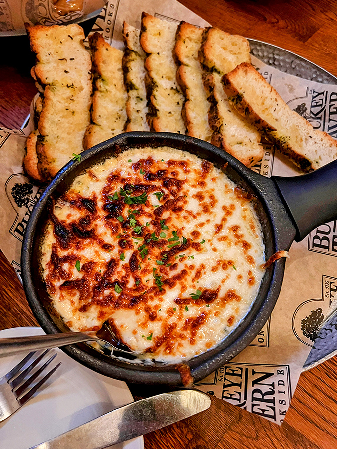 That bubbling crab dip could convert even the most stubborn landlubber into a seafood enthusiast.