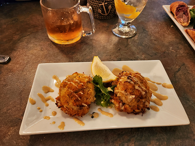 Golden-brown crab cakes that are all meat and no filler&mdash;the holy grail of seafood appetizers. That drizzle of remoulade sauce is just showing off.
