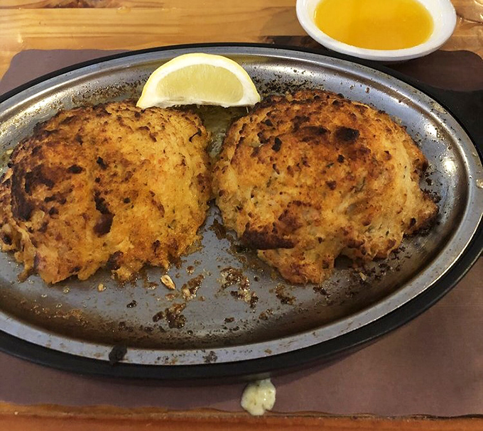 Golden-brown crab cakes with a hint of lemon&mdash;proof that simple preparation lets quality ingredients sing their own delicious song.