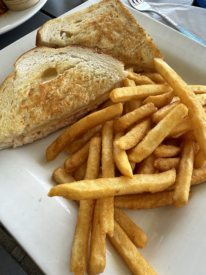 The humble crab sandwich elevated to art form&mdash;crispy bread embracing what appears to be the day's freshest catch and perfect fries.