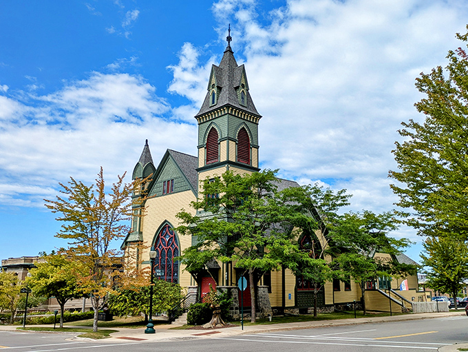 This isn't just a church—it's architectural eye candy that anchors Petoskey's streetscape with stained glass and soaring spires.