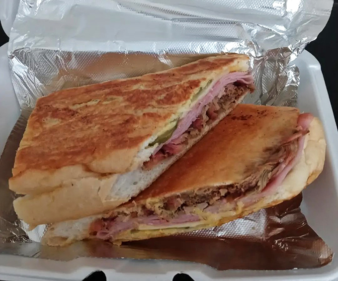 The Que-Ban sandwich: where Tampa's Cuban heritage meets barbecue brilliance. A cross-cultural masterpiece that belongs in the Sandwich Hall of Fame.