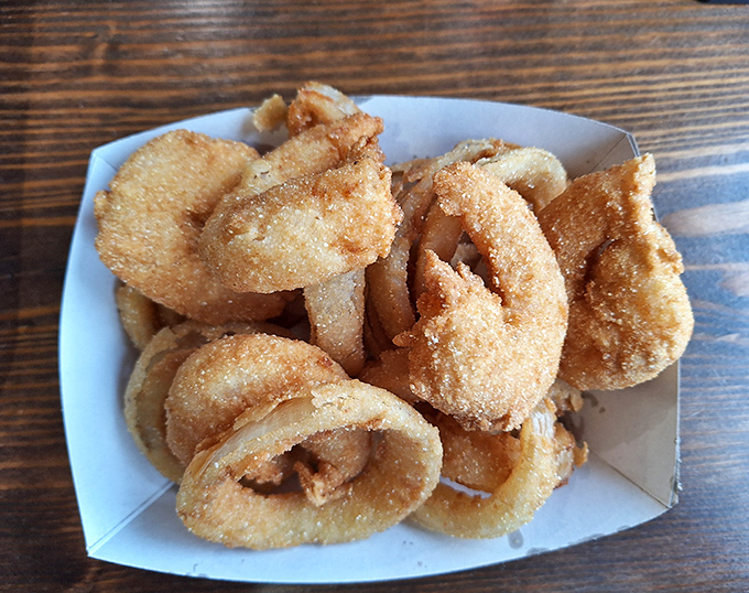 Crispy, golden onion rings that achieve that perfect crunch-to-tenderness ratio &ndash; the kind that make you wonder why you don't order them more often.