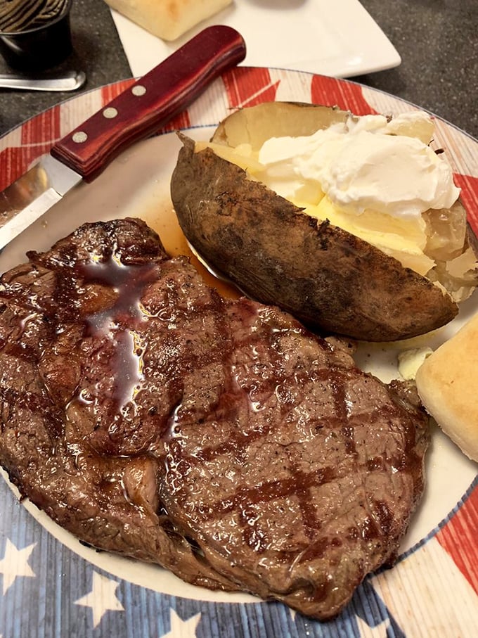 A steak that's been introduced to fire with just the right amount of respect, paired with a potato that's living its best life.