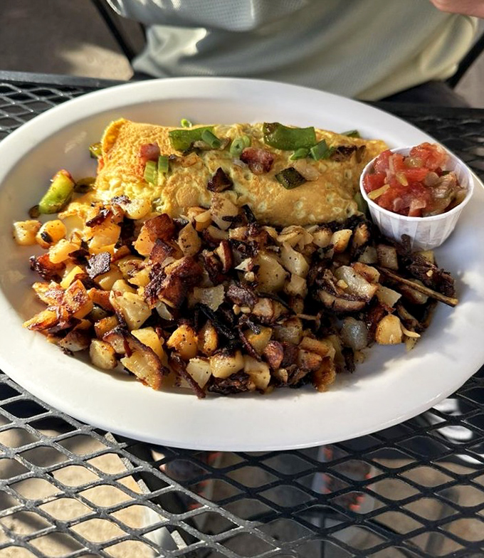 This Denver omelet with perfectly crisped potatoes isn't just breakfast &ndash; it's an edible love letter to morning.