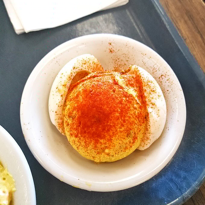 Deviled eggs sprinkled with paprika&mdash;a humble classic elevated to art form. Grandmothers everywhere would give their silent nod of approval to these creamy delights.