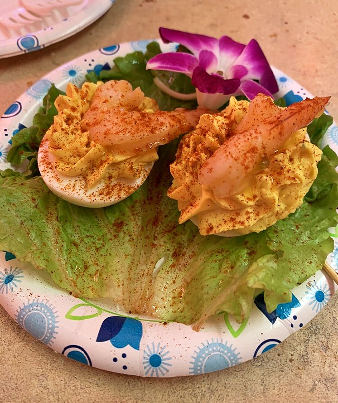 These deviled eggs have been promoted to heaven status with the addition of perfectly cooked shrimp and a dusting of paprika that looks like edible confetti.