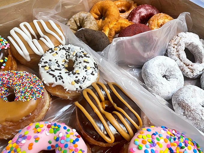 A box of these donuts in your passenger seat creates the ultimate road trip dilemma: how many can you eat before reaching your destination?