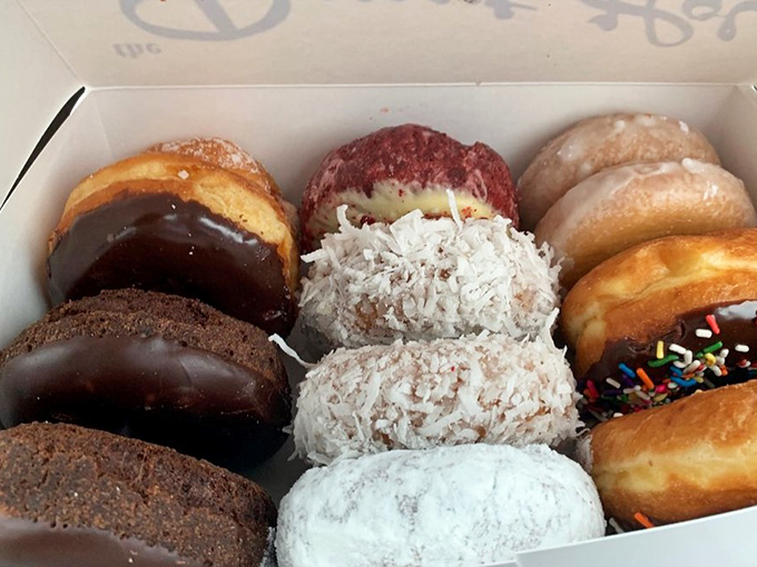 A box of donuts that answers the eternal question: "Why have one when you can try them all?" Diet starts tomorrow.