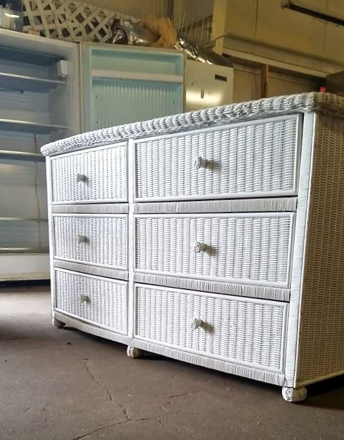 This white wicker dresser isn't just storage&mdash;it's coastal charm waiting to brighten a bedroom. Beachside vibes in the heart of lake country.