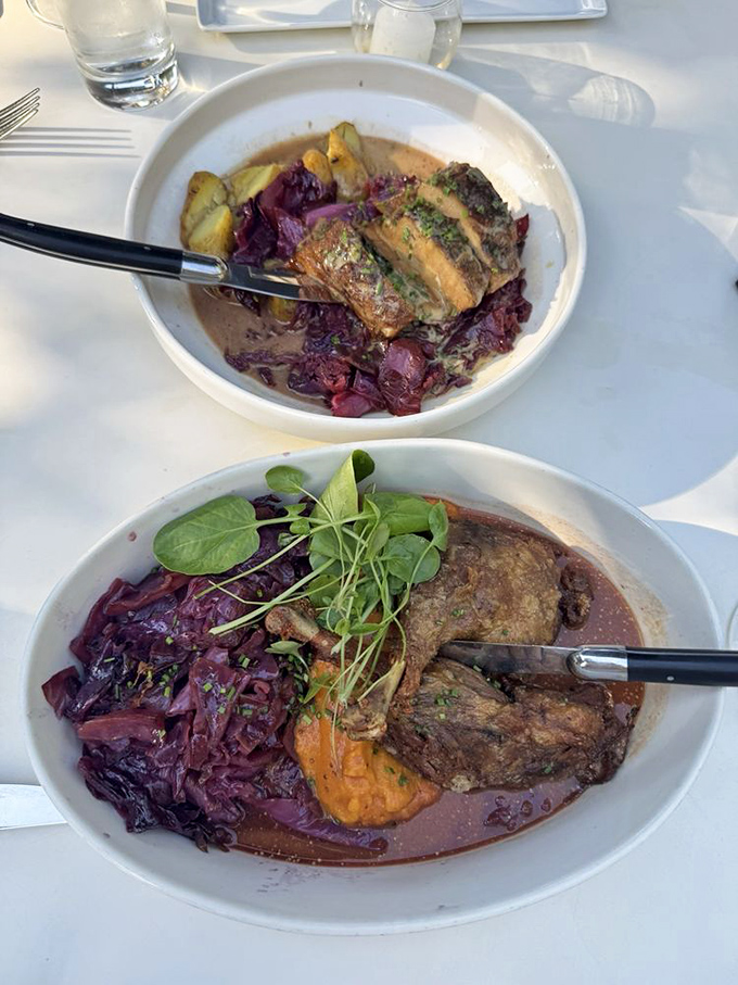 Duck confit nestled on a bed of red cabbage&mdash;the meat so tender it practically surrenders to your fork with a Gallic shrug.