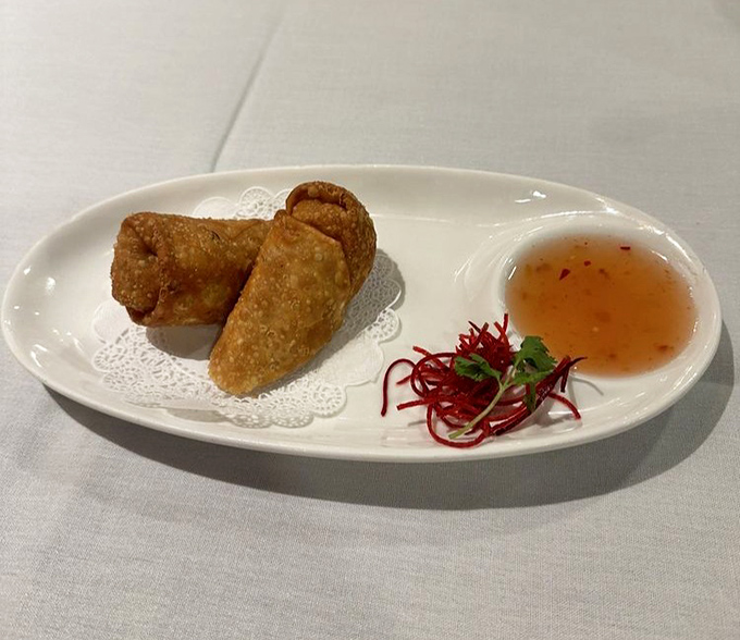These aren't your average egg rolls&mdash;they're the overachievers of the appetizer world, perfectly crisp with that sweet chili sauce singing backup.