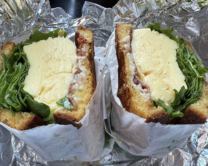 The egg sandwich that launched a thousand return visits. Fluffy eggs and melty cheese between toasted bread&mdash;proof that perfection doesn't require complexity.