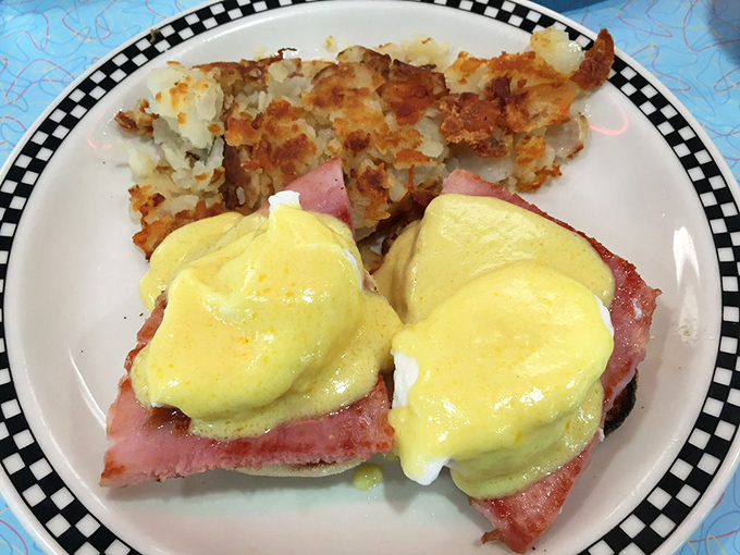Eggs Benedict: where hollandaise meets ham in a morning romance that's lasted longer than most Hollywood marriages. Those hash browns deserve their own fan club.