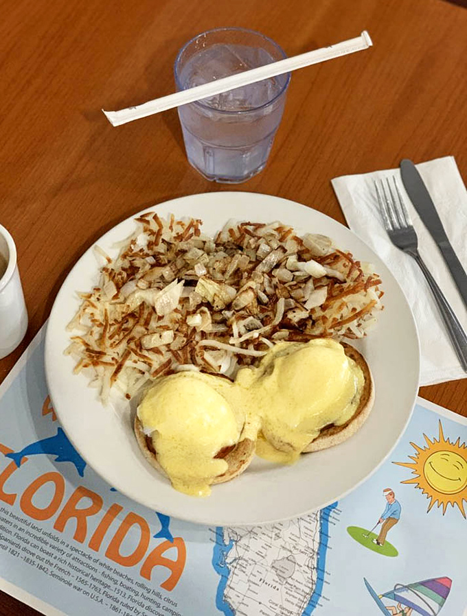 Eggs Benedict: where breakfast gets its tuxedo on. Those golden yolks are ready for their close-up, and the hash browns are playing a perfect supporting role.