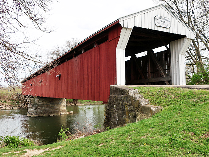 The Eldean Covered Bridge stands as a crimson reminder of simpler times, spanning not just water but connecting us to our collective past.