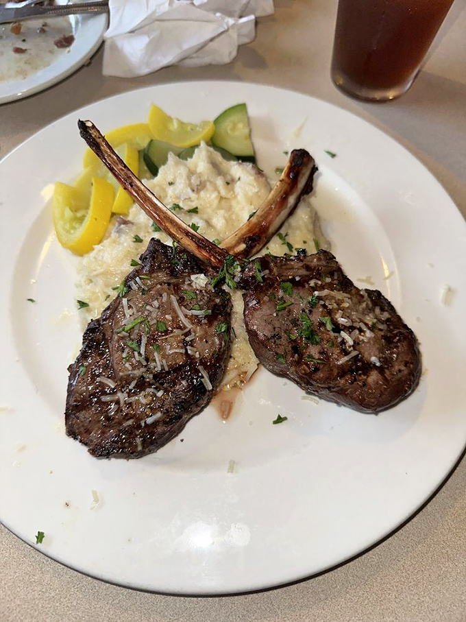 These elk chops aren't just dinner; they're a masterclass in simplicity, served with creamy risotto and fresh vegetables.