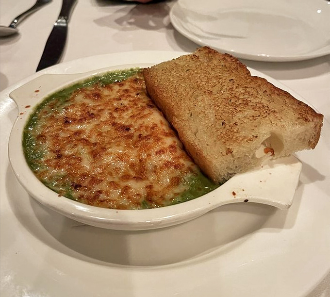 This isn't just escargot&mdash;it's a buttery, garlicky pool party where snails dress in their finest herb-flecked attire.