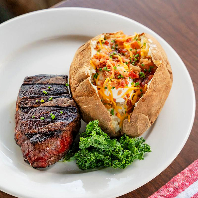 A perfectly seared filet mignon alongside a loaded baked potato &ndash; comfort food that's dressed for a night on the town.
