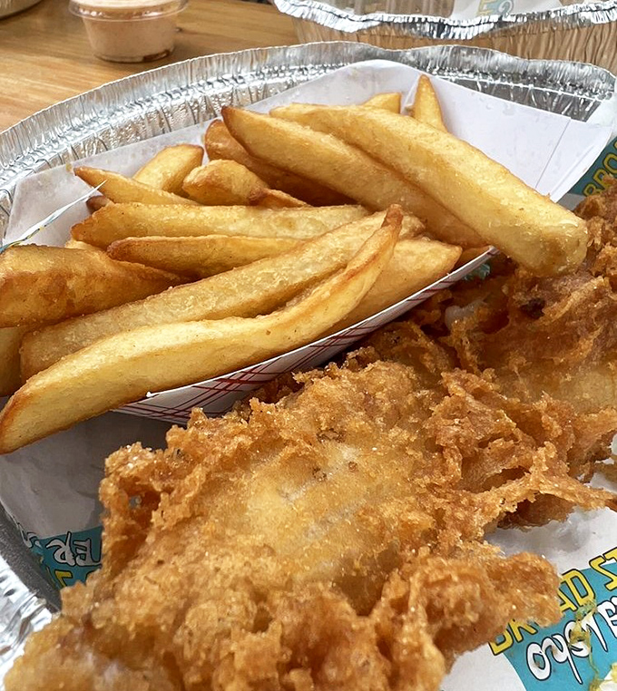 Golden-battered fish alongside perfectly crisp fries&mdash;proof that sometimes the classics become classics for a reason. The kind of dish that demands a sea breeze and cold beer.