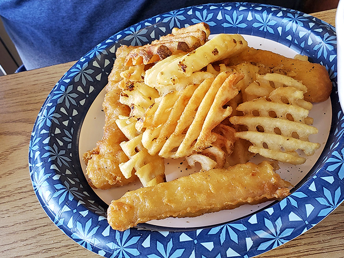 Fish and chips that would make a British pub nervous. Those waffle fries aren't just a side&mdash;they're the supporting actors who deserve their own Oscar.