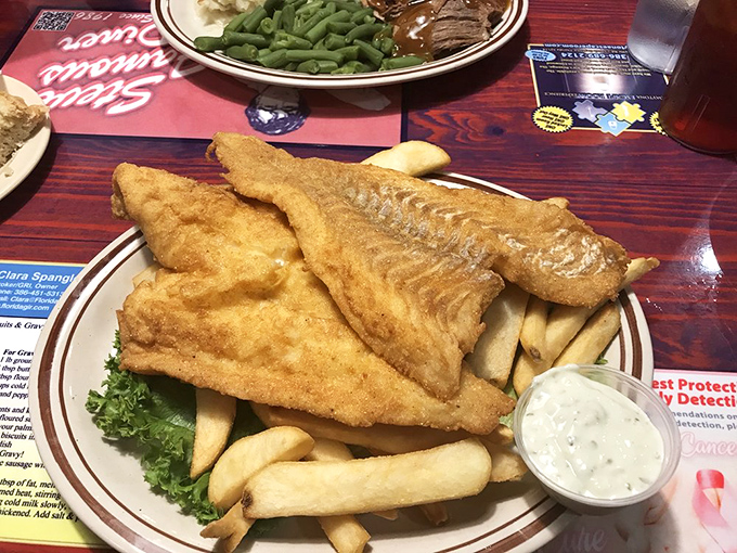 Golden-battered fish fillets that shatter with each bite, paired with hand-cut fries and homemade tartar sauce – the ocean's finest catch, diner-style.