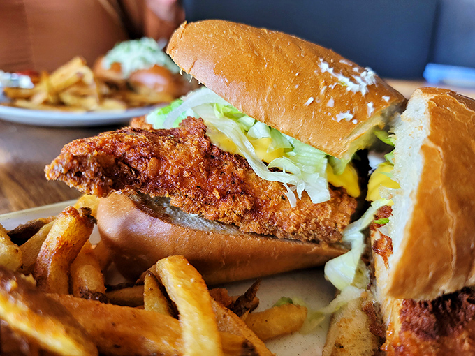 A fish sandwich that makes you question everything you thought you knew about fish sandwiches. That golden crust is making promises the flavor absolutely keeps.