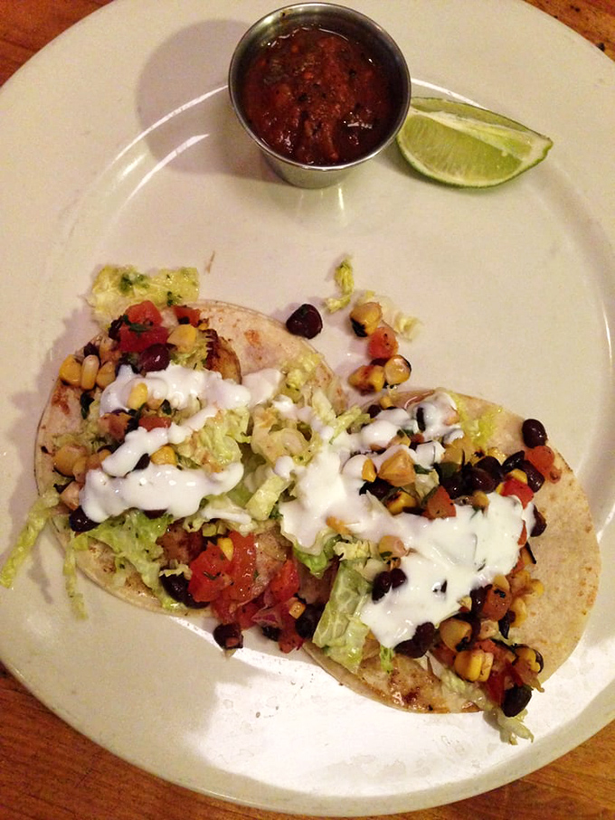 These tacos aren't just food; they're edible postcards from the border, delivering sunshine and satisfaction with every colorful, creamy, crunchy bite.