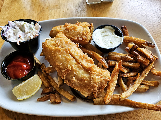 Golden-battered fish that shatters with each bite, paired with hand-cut fries. The kind of dish that makes you understand why people line up for good food.