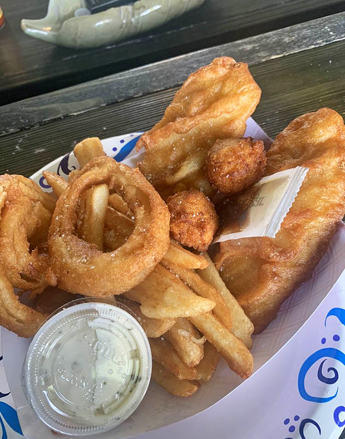 A seafood medley that brings the ocean to Ohio. Crispy onion rings, golden fish, and hushpuppies create a trifecta of fried perfection.