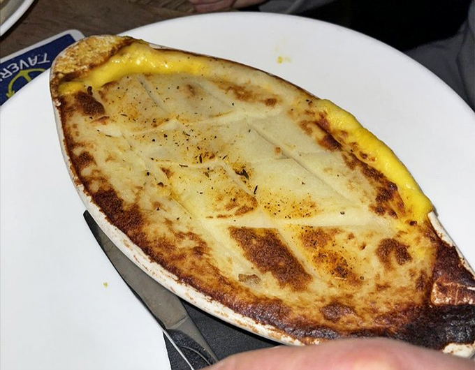 The Fisherman's Pie doesn't just break the surface&mdash;it dives deep into comfort food territory with a golden crust that whispers, "Resistance is futile."