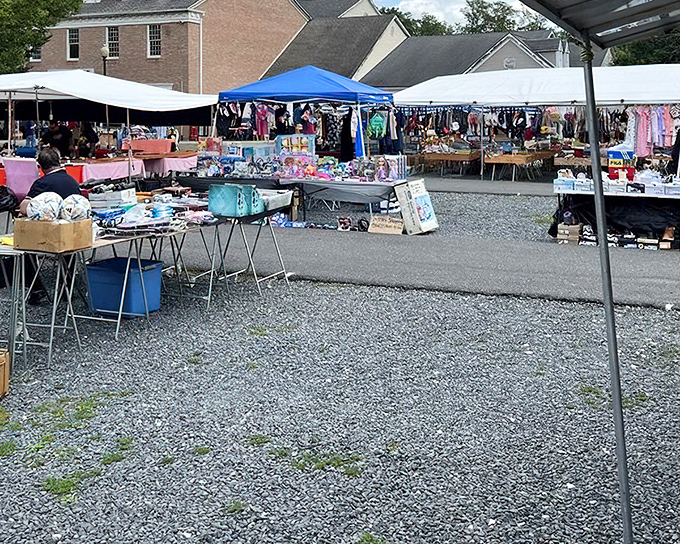A sea of tables under summer skies creates the perfect hunting ground for those who believe shopping should always include fresh air.