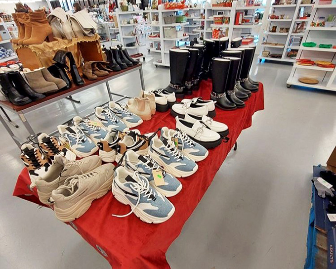 Shoes lined up like hopeful contestants, each pair with a story to tell and miles left to travel.