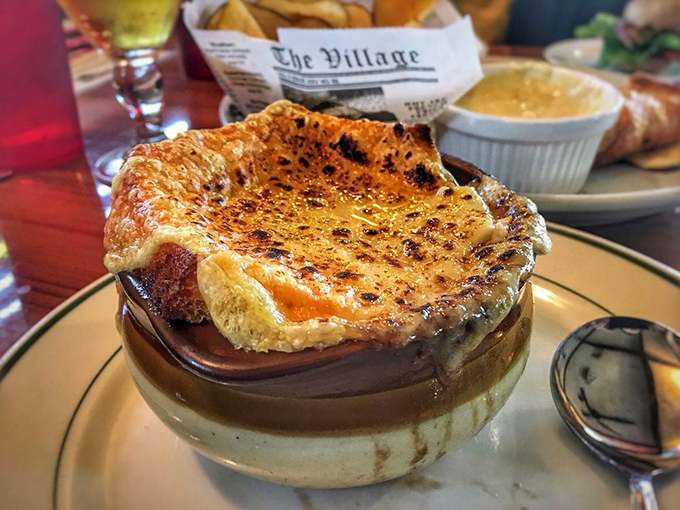 This isn't soup&mdash;it's a cheese-crowned masterpiece with deep, rich broth that French onion fans cross town for. Worth every delicious calorie.