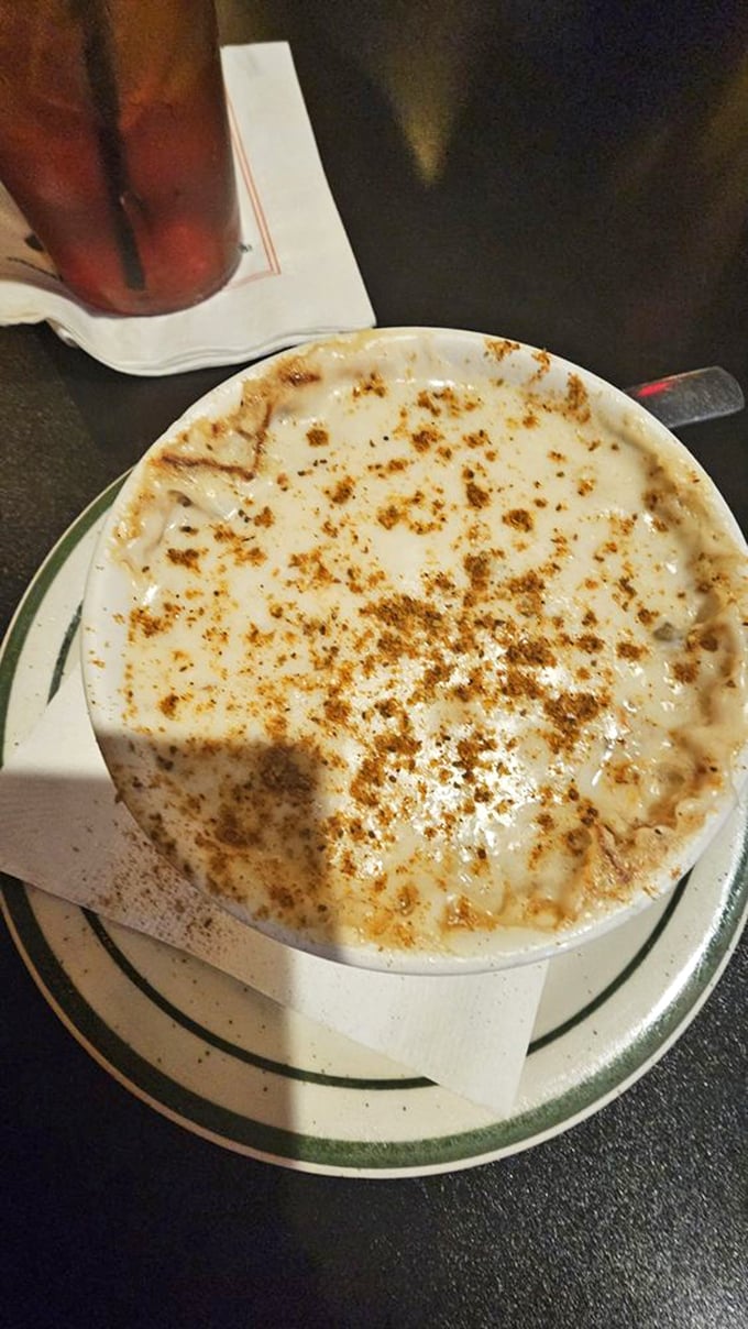 The French onion soup arrives with a golden crown of bubbling cheese that stretches dramatically with each spoonful&mdash;comfort in a crock.