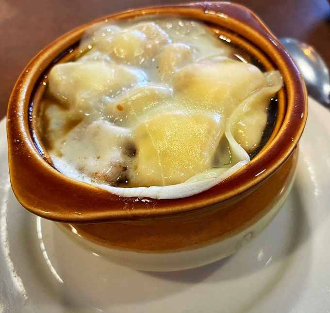 French onion soup done right &ndash; that cheese pull could win an Olympic gold medal for perfect execution.